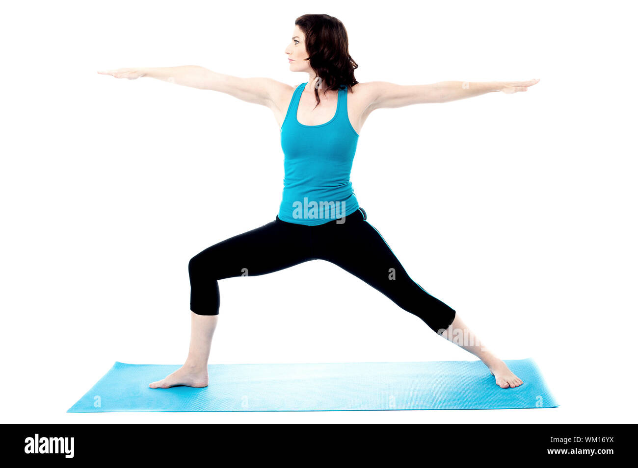 Exercising woman, arms stretched out Stock Photo - Alamy
