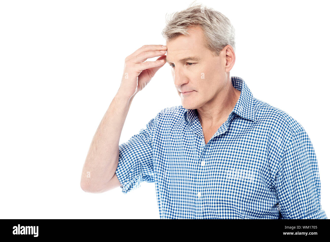 Upset aged man with hand on the forehead Stock Photo - Alamy
