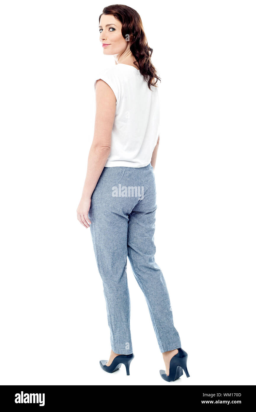 Smiling beautiful woman looking back,isolated white background Stock ...