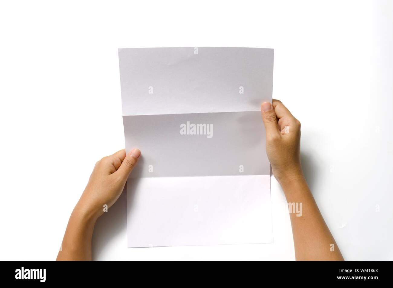woman two hands holding paper Stock Photo - Alamy
