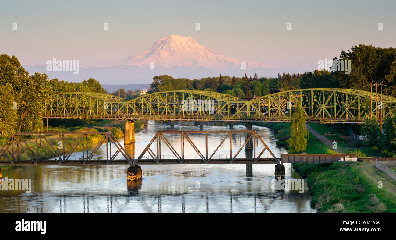 The Puyallup River meanders down from the glaciers on Mount Rainier ...