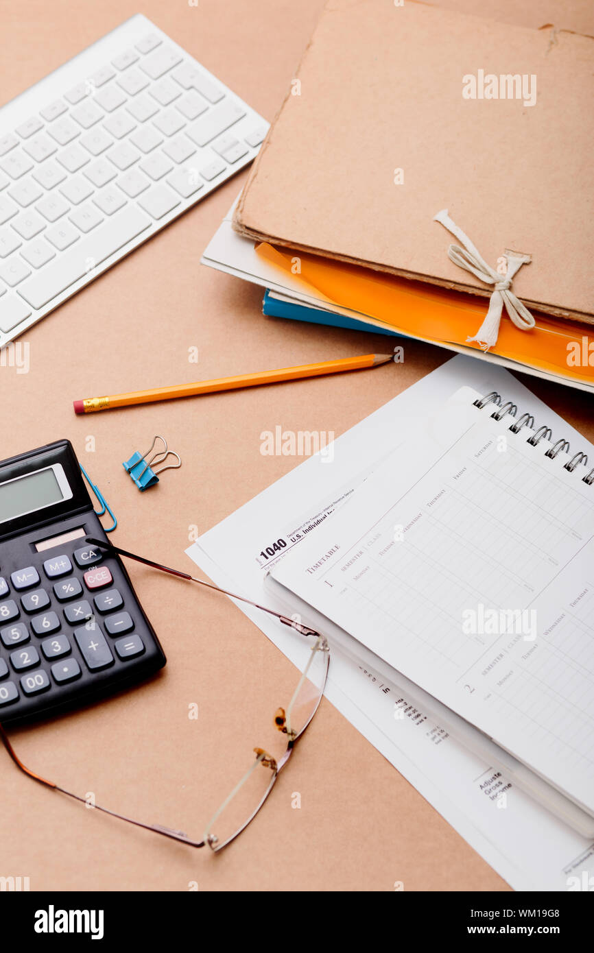 Documents calculator hi-res stock photography and images - Alamy