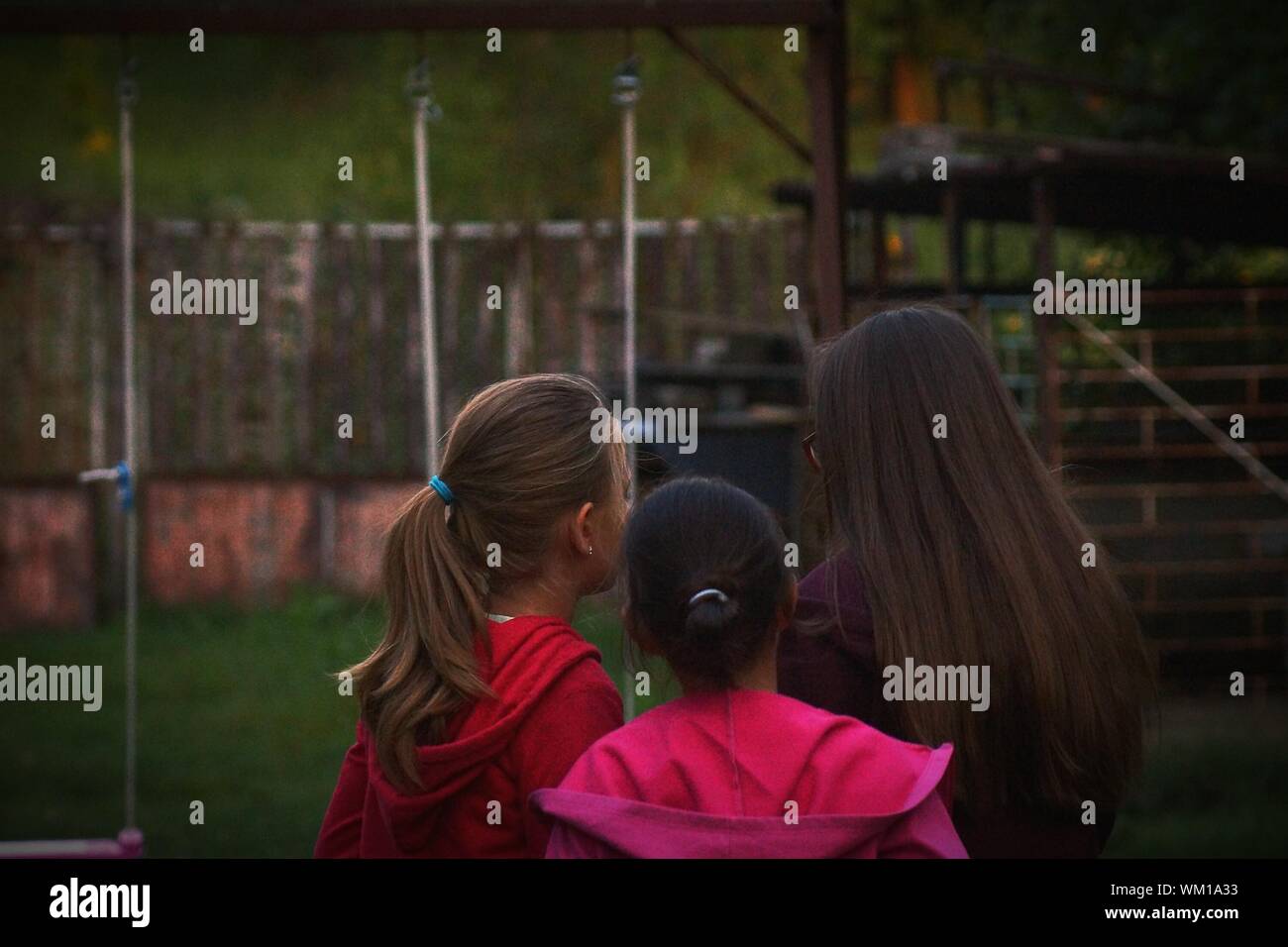 Back view girls hi-res stock photography and images - Alamy