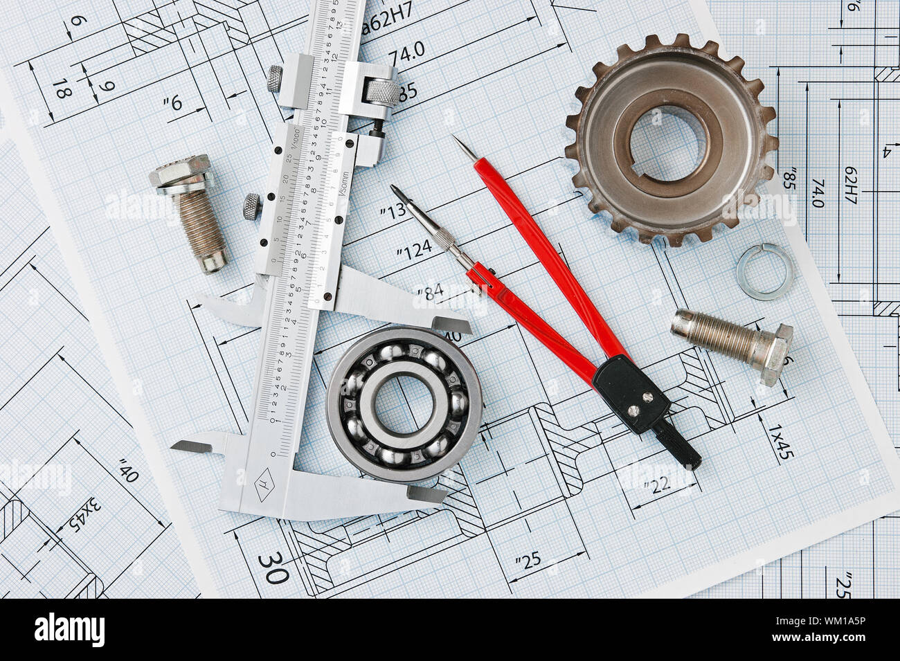 tools and mechanisms detail on the background of technical drawings ...