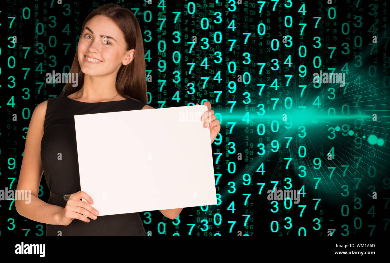 Businesswoman holding empty paper. Green glowing figures as backdrop ...