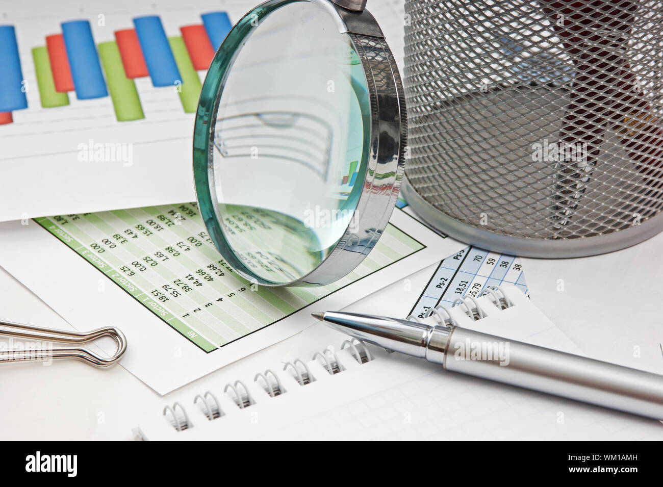Graphs tables and documents laid on the table Stock Photo - Alamy