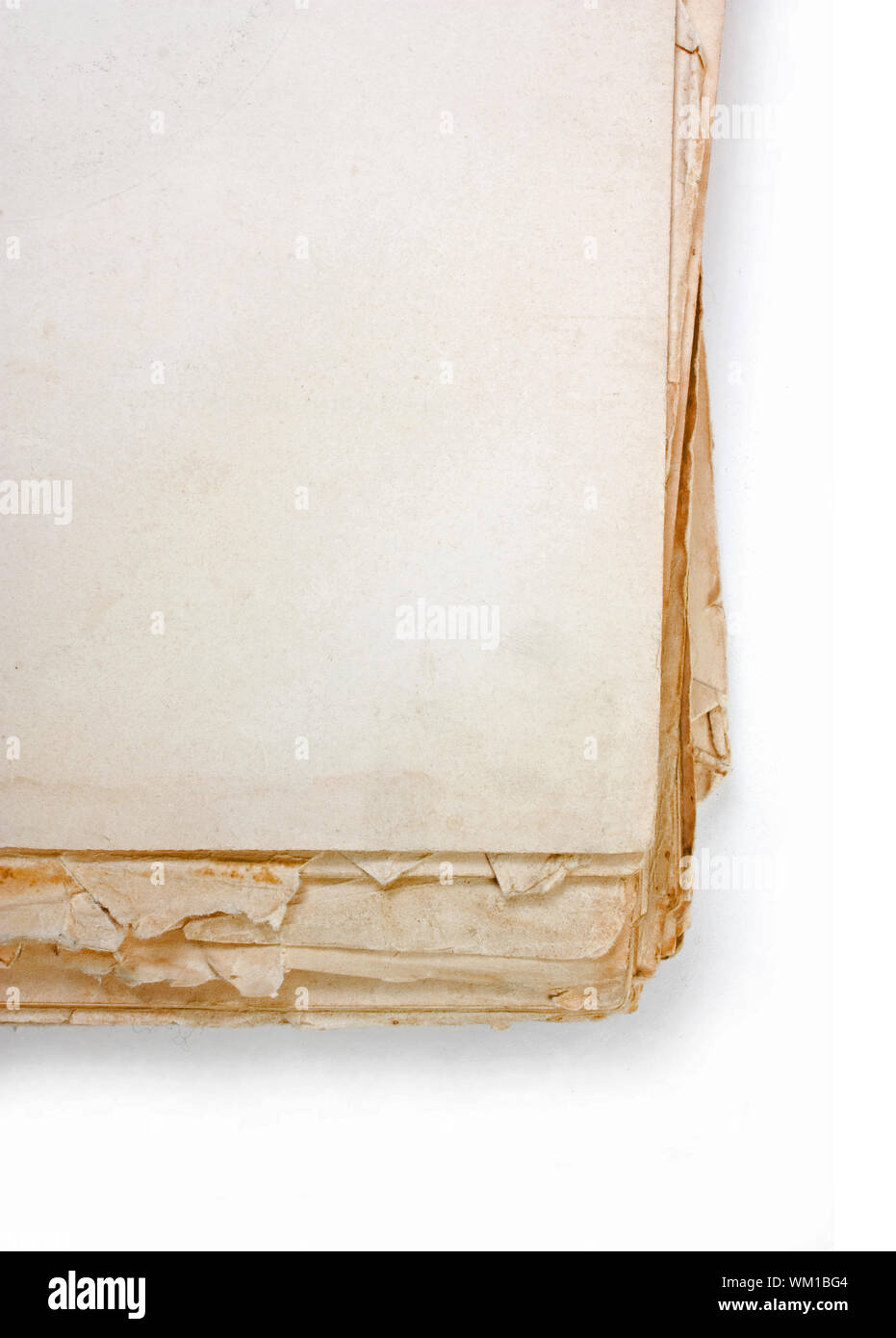 An old book with a crumpled sheet and hardcover isolated on white ...