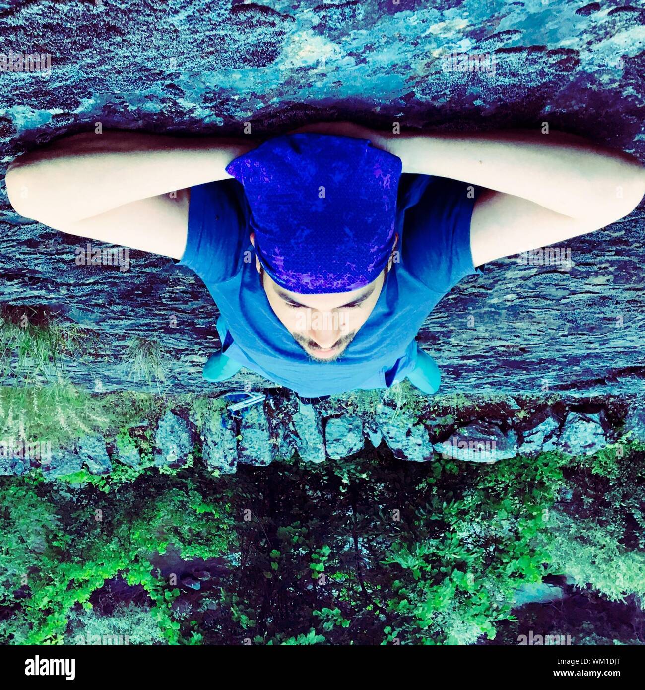 Young man upside down hi-res stock photography and images - Alamy