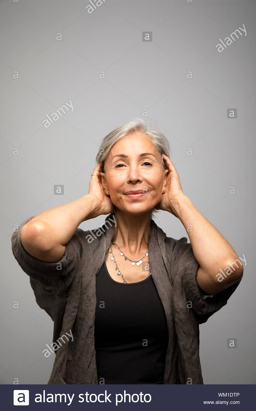 Woman short hair hand hi-res stock photography and images - Alamy