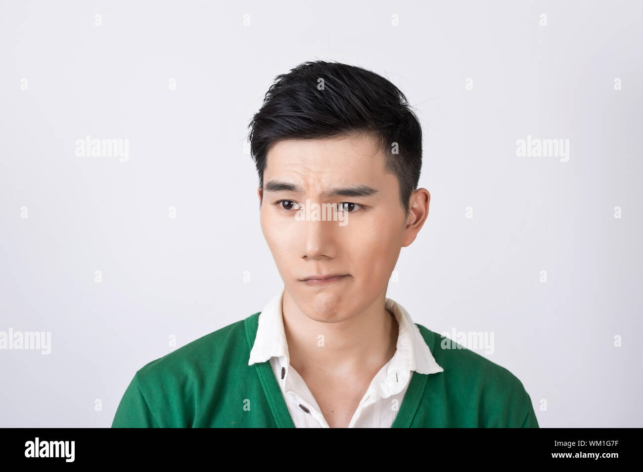 Funny facial expression, closeup Asian young man Stock Photo - Alamy