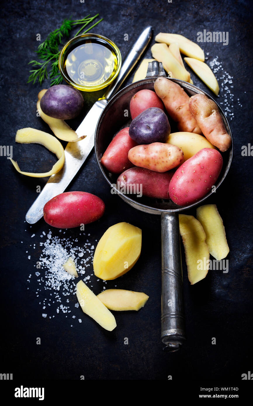 Potato preparation. Fresh organic vegetables. Food background. Healthy ...