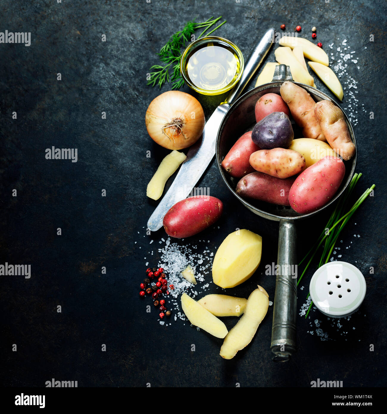 Potato preparation. Fresh organic vegetables. Food background. Healthy ...