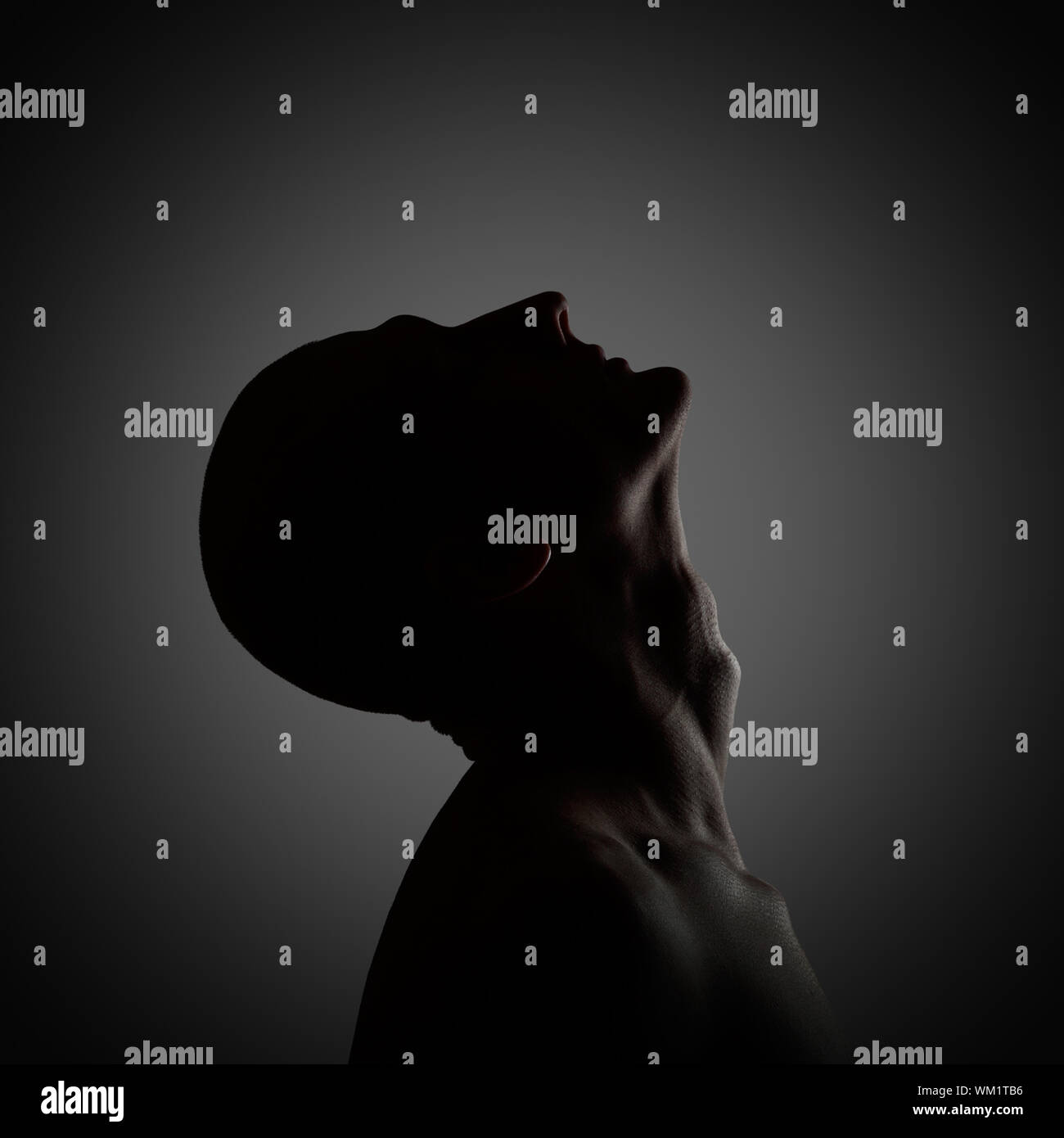 Creepy profile of the mysterious man. Low-key lighting Stock Photo - Alamy