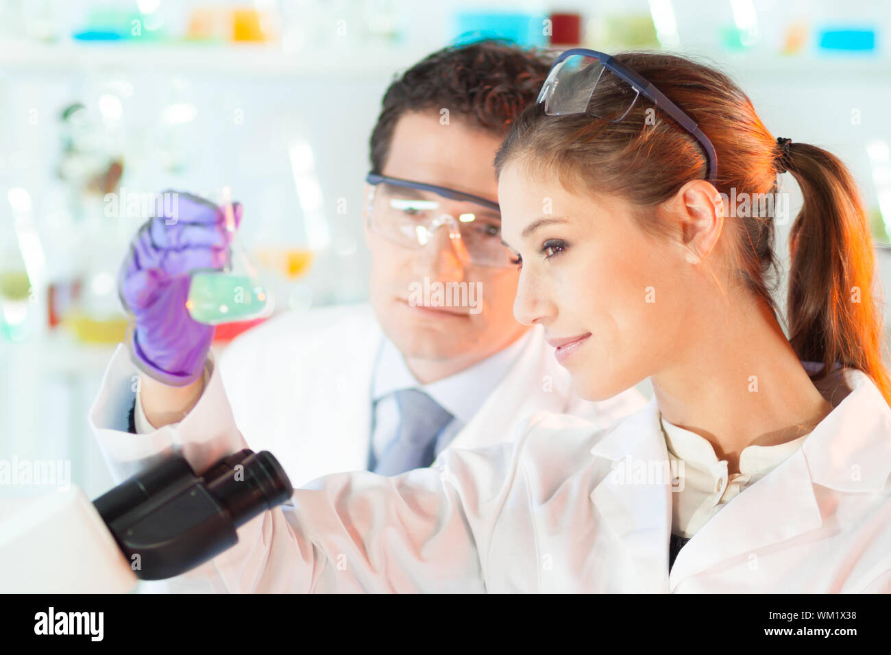Researcher observing indikator colour shift hi-res stock photography ...