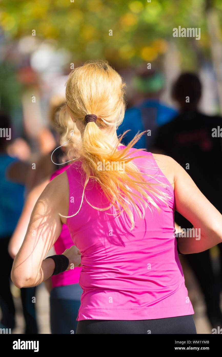Group of people running Stock Photo - Alamy