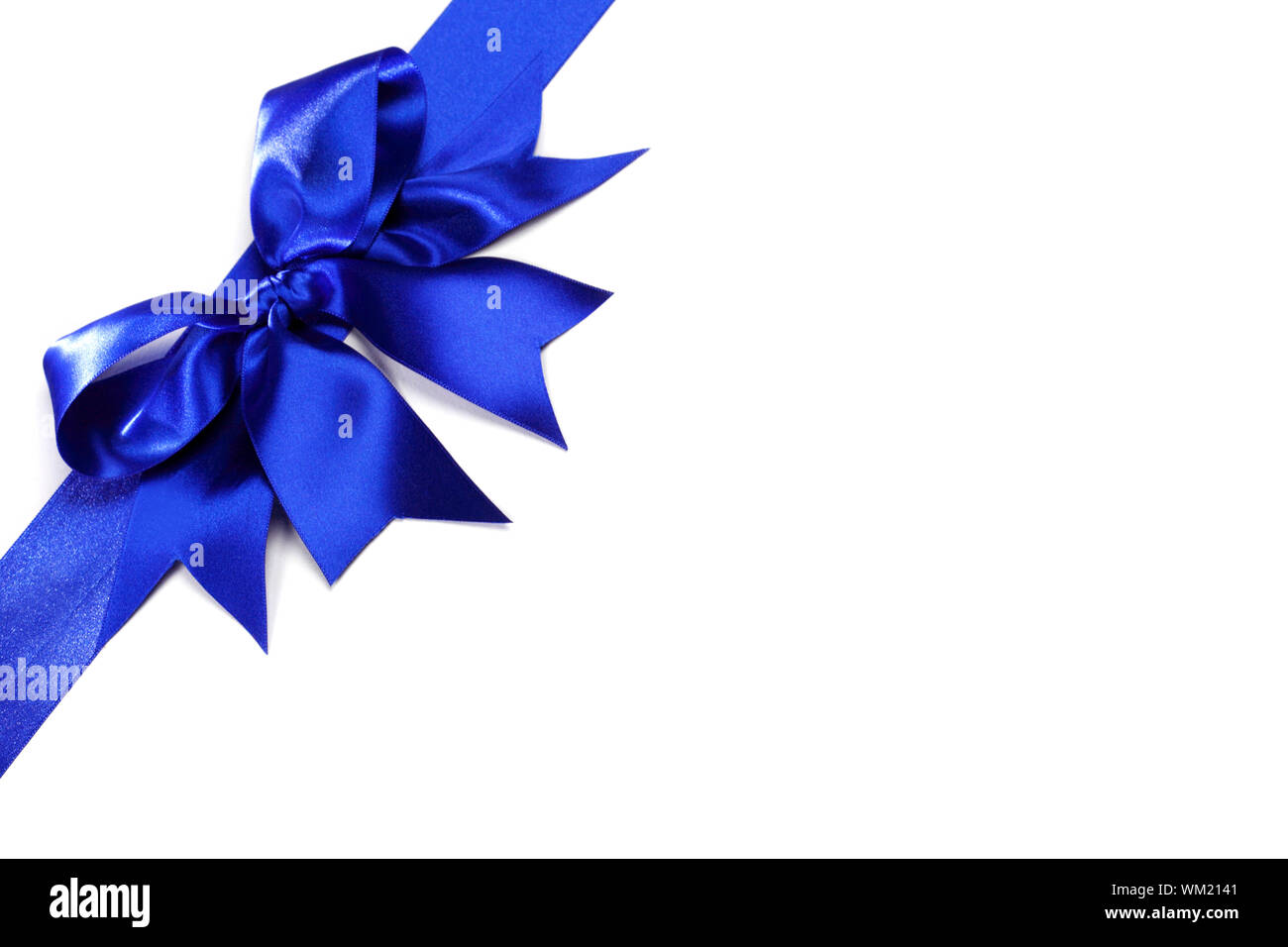 Shiny blue satin ribbon and bow isolated on white background Stock ...
