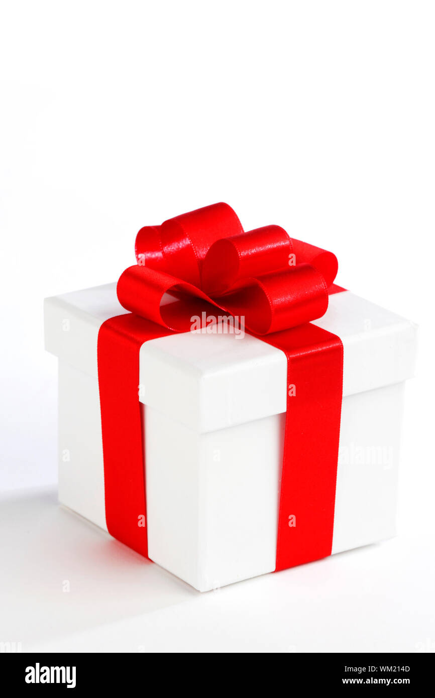 One white gift box with red bow isolated on white background Stock ...