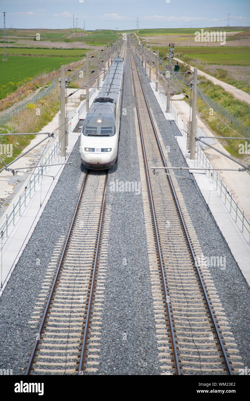 fast speed train coming in a landscape from Spain Stock Photo - Alamy