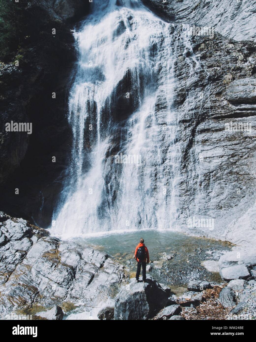 Person looking at waterfall hi-res stock photography and images - Alamy
