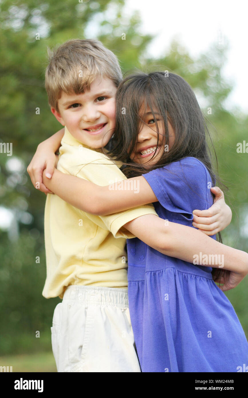 Best friends hugging, multicultural friendships, diversity Stock Photo ...