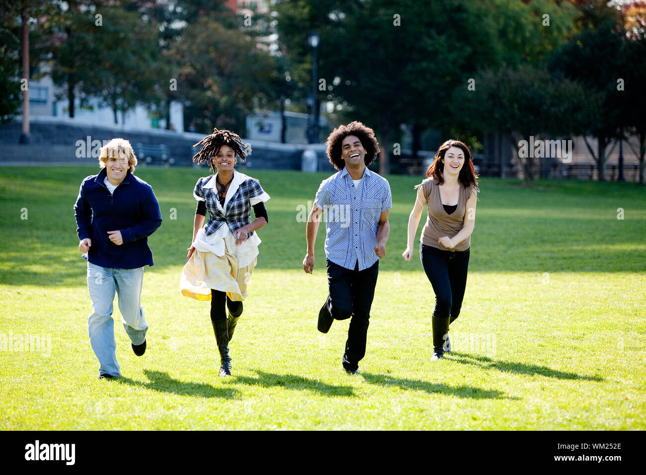 Running towards camera happy urban hi-res stock photography and images ...
