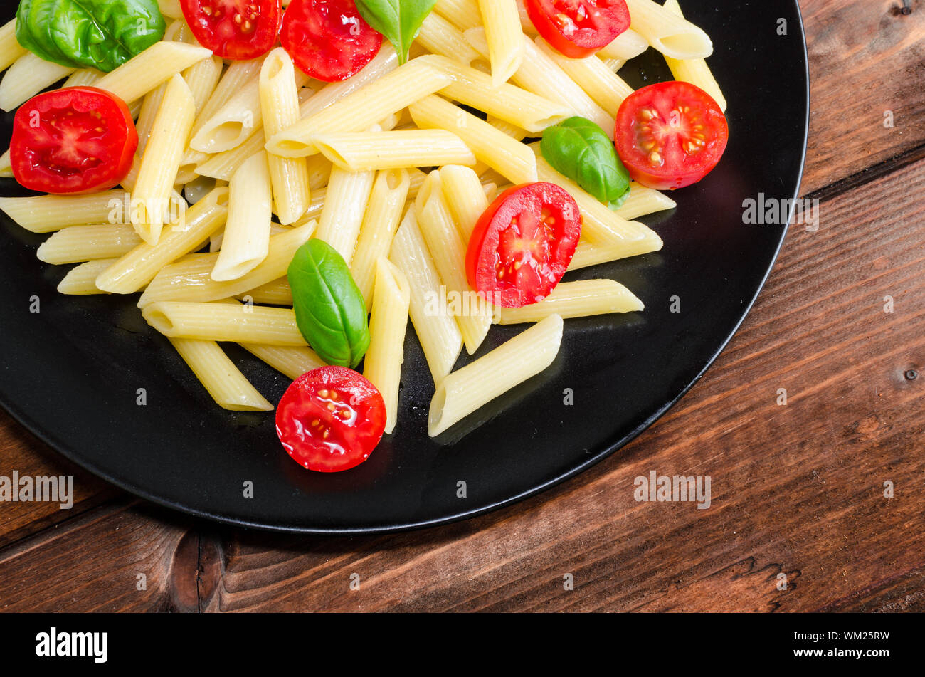 Pasta with tamato and basil, simple like Italy Stock Photo - Alamy