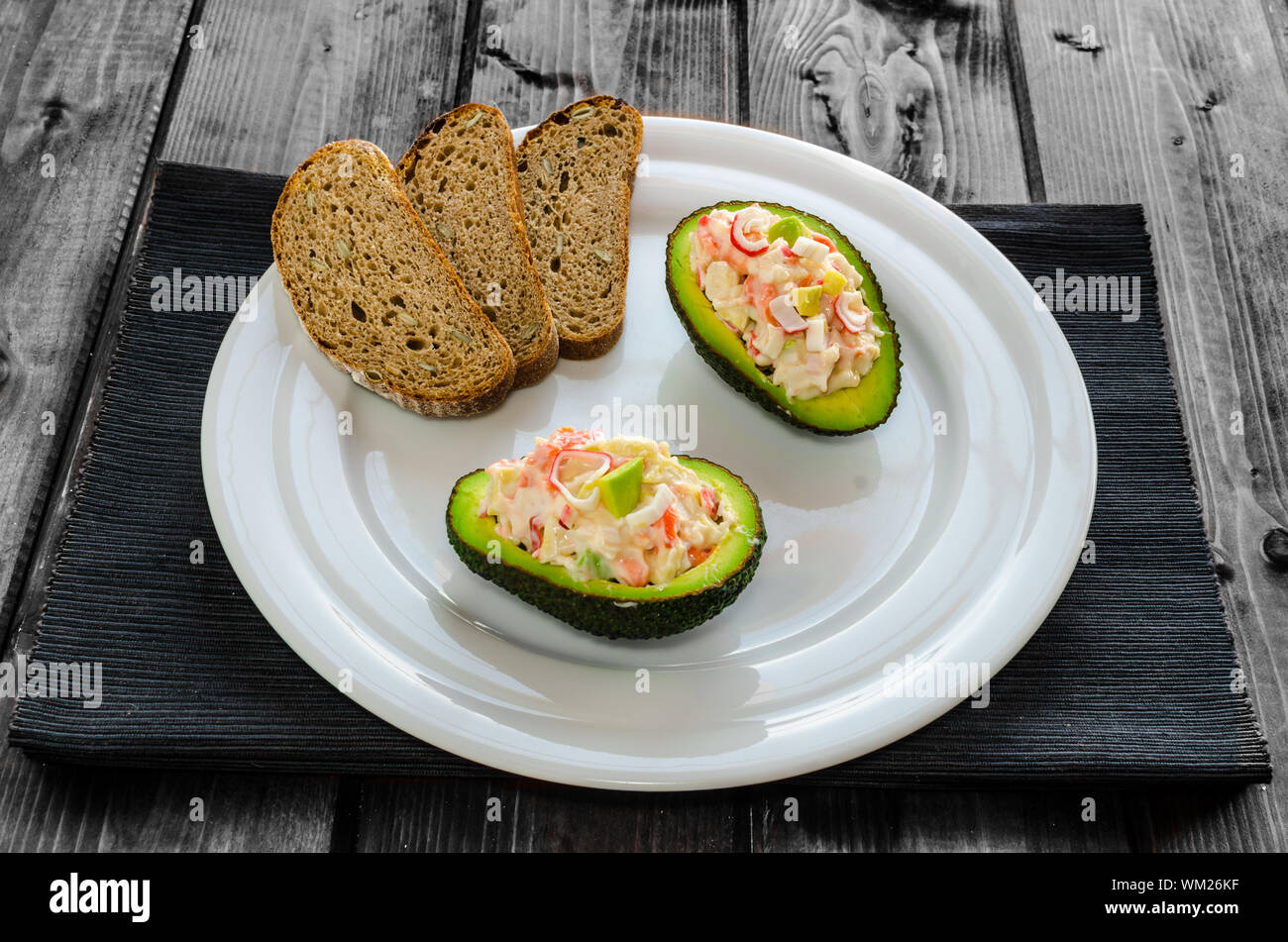 Stuffed with avocado with surimi sticks, paprika mayonnaise with bio ...