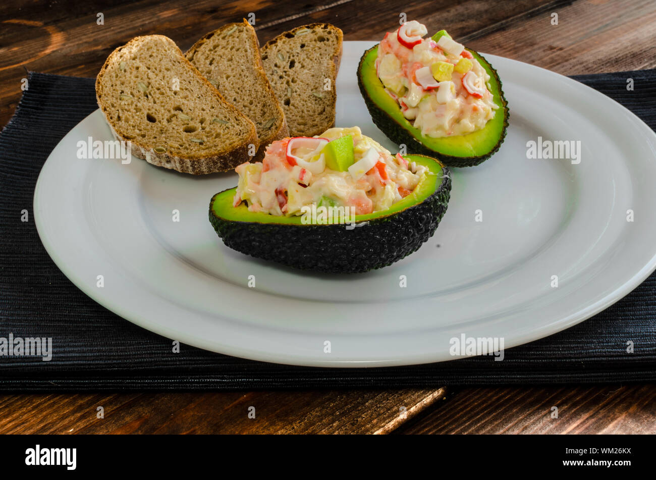 Stuffed with avocado with surimi sticks, paprika mayonnaise with bio ...