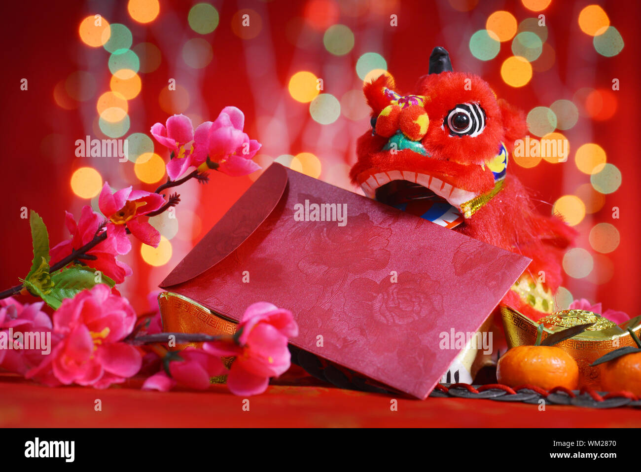 Chinese new year festival decorations, miniature dancing lion and ang ...