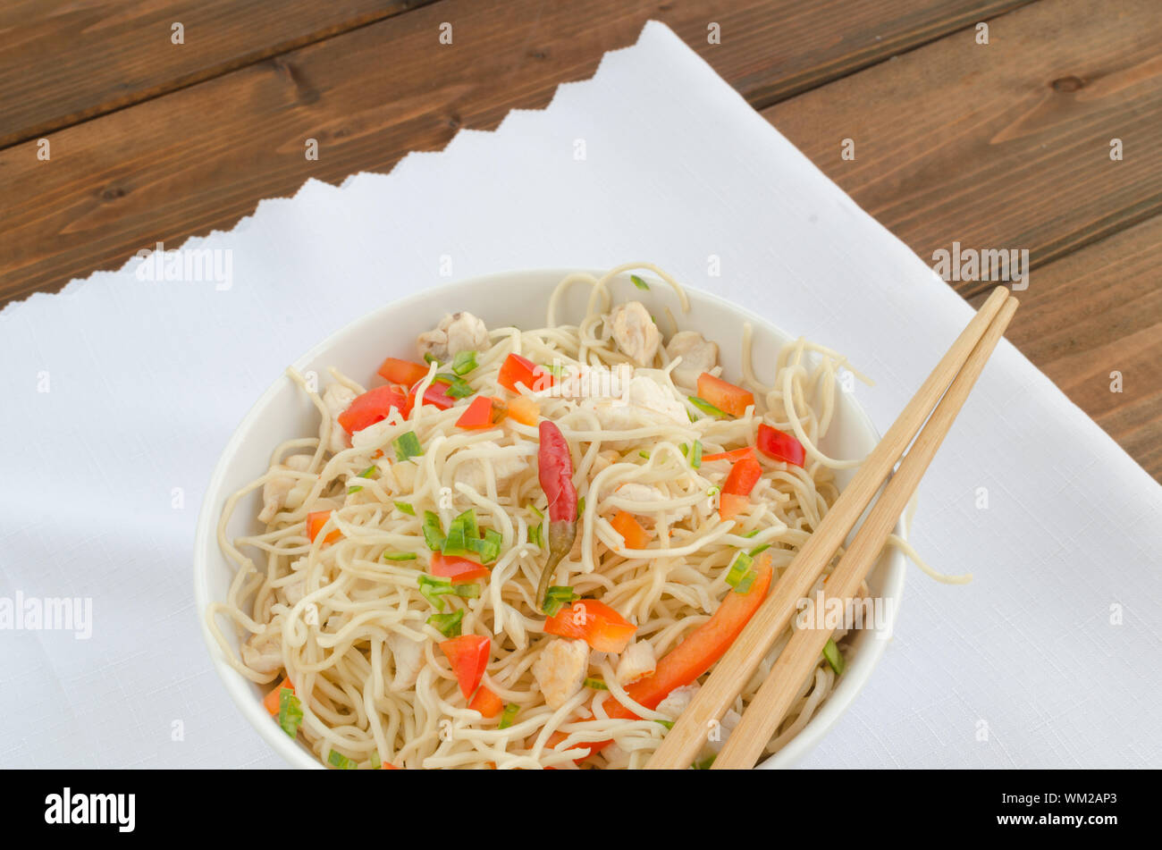 Chinese noodles, fast but delicious food with chopsticks Stock Photo ...