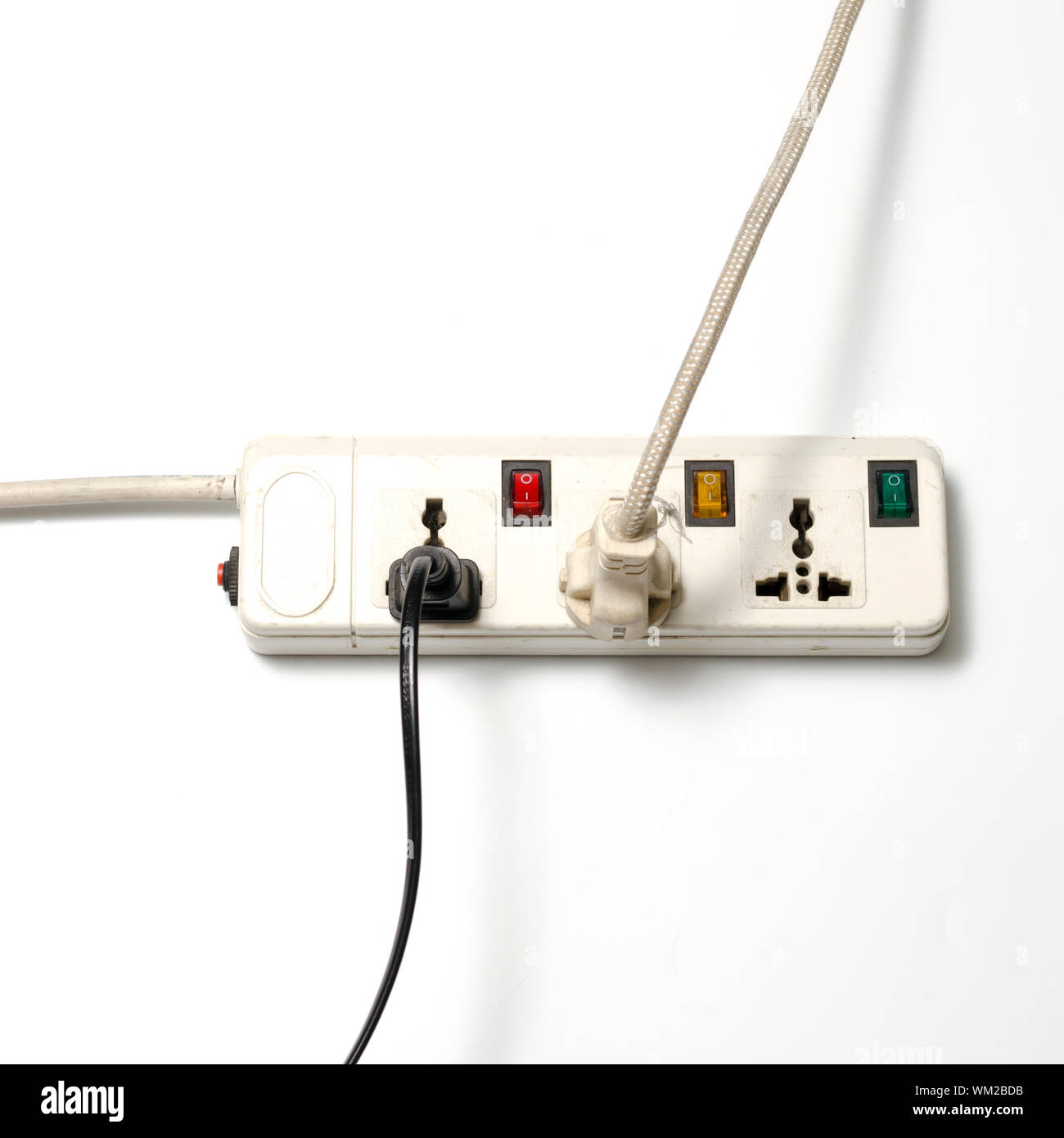 electric multiple socket outlet on a white background Stock Photo - Alamy