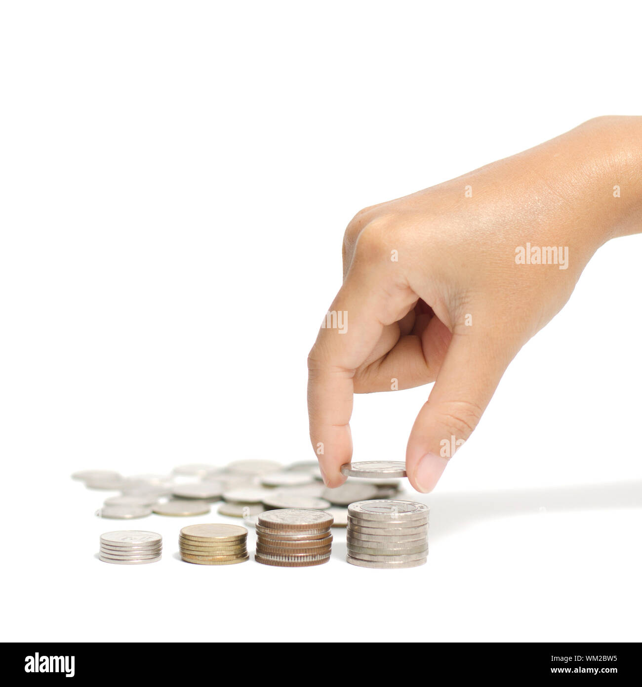 hand putting stack of coins Stock Photo - Alamy