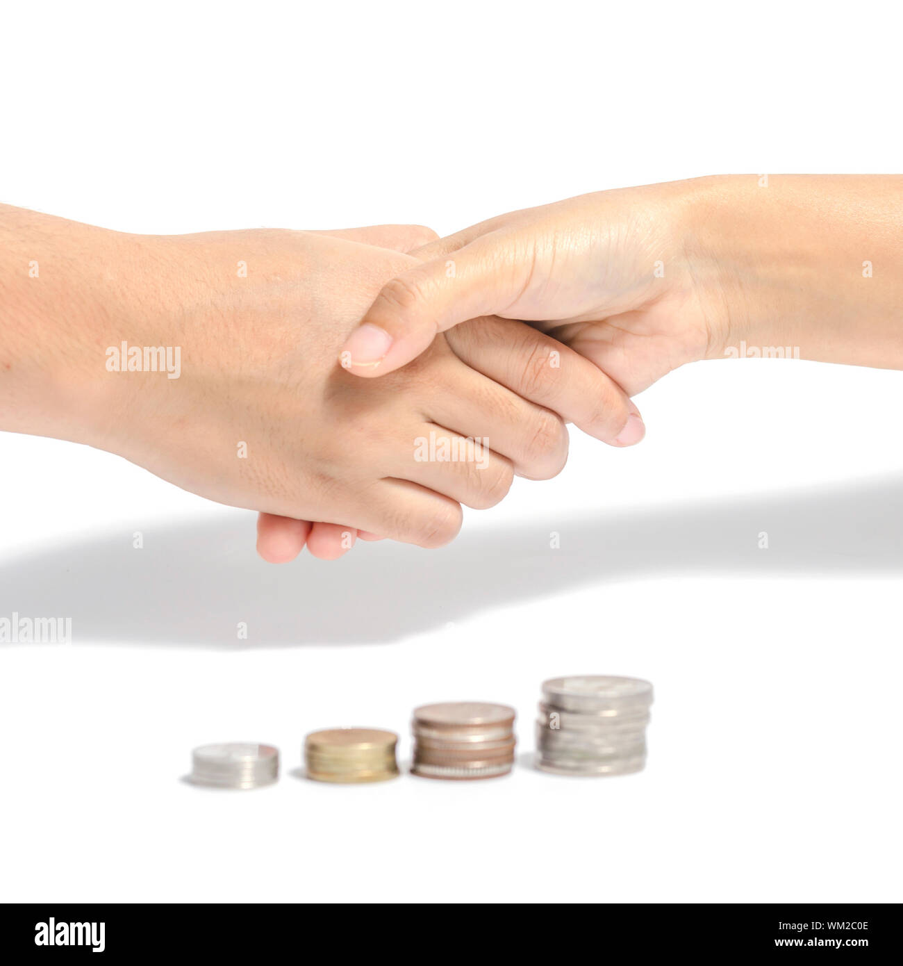 shake hand and coin Stock Photo - Alamy