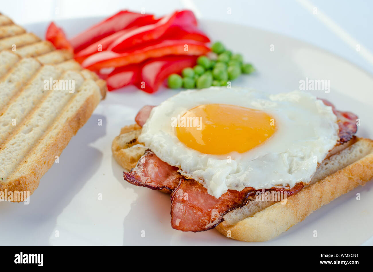 Fresh breakfest - ham, eggs, vegetable and toast homemade Stock Photo ...