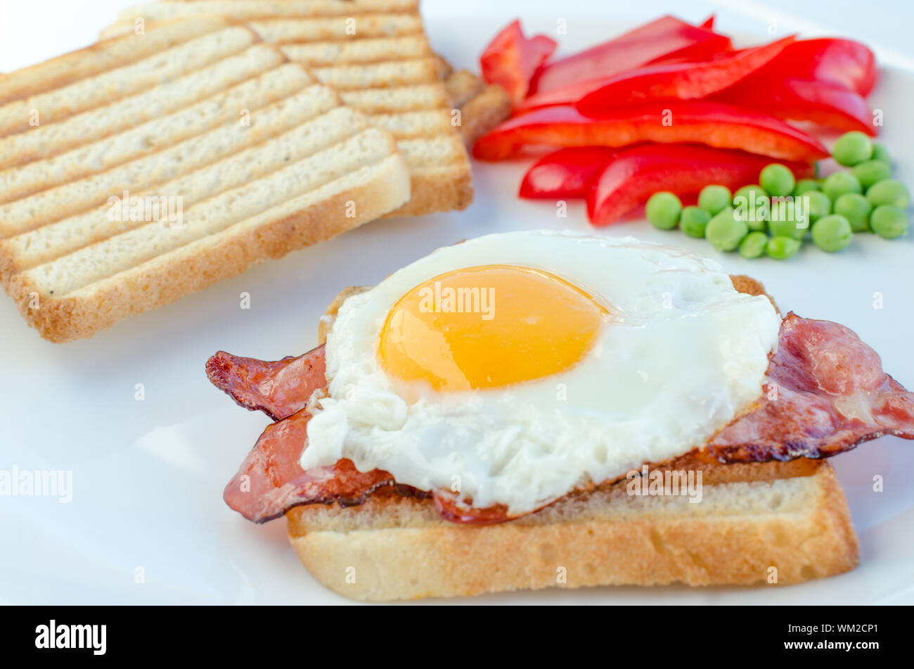 Fresh breakfest - ham, eggs, vegetable and toast homemade Stock Photo ...