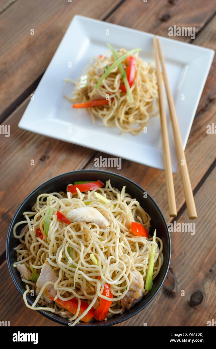 Chinese noodles, fast but delicious food with chopsticks Stock Photo ...