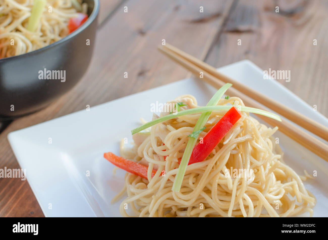 Chinese noodles, fast but delicious food with chopsticks Stock Photo ...