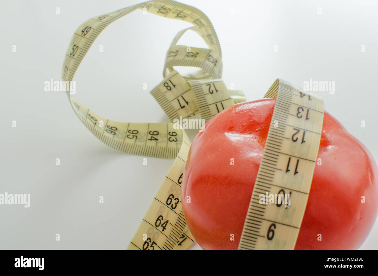 Simple picture of tomato with meter, on white background Stock Photo ...
