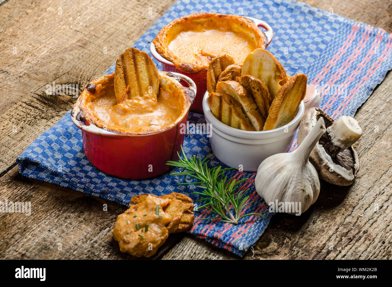 Tomato and cheese dip baked with crispy garlic panini toast with herbs ...