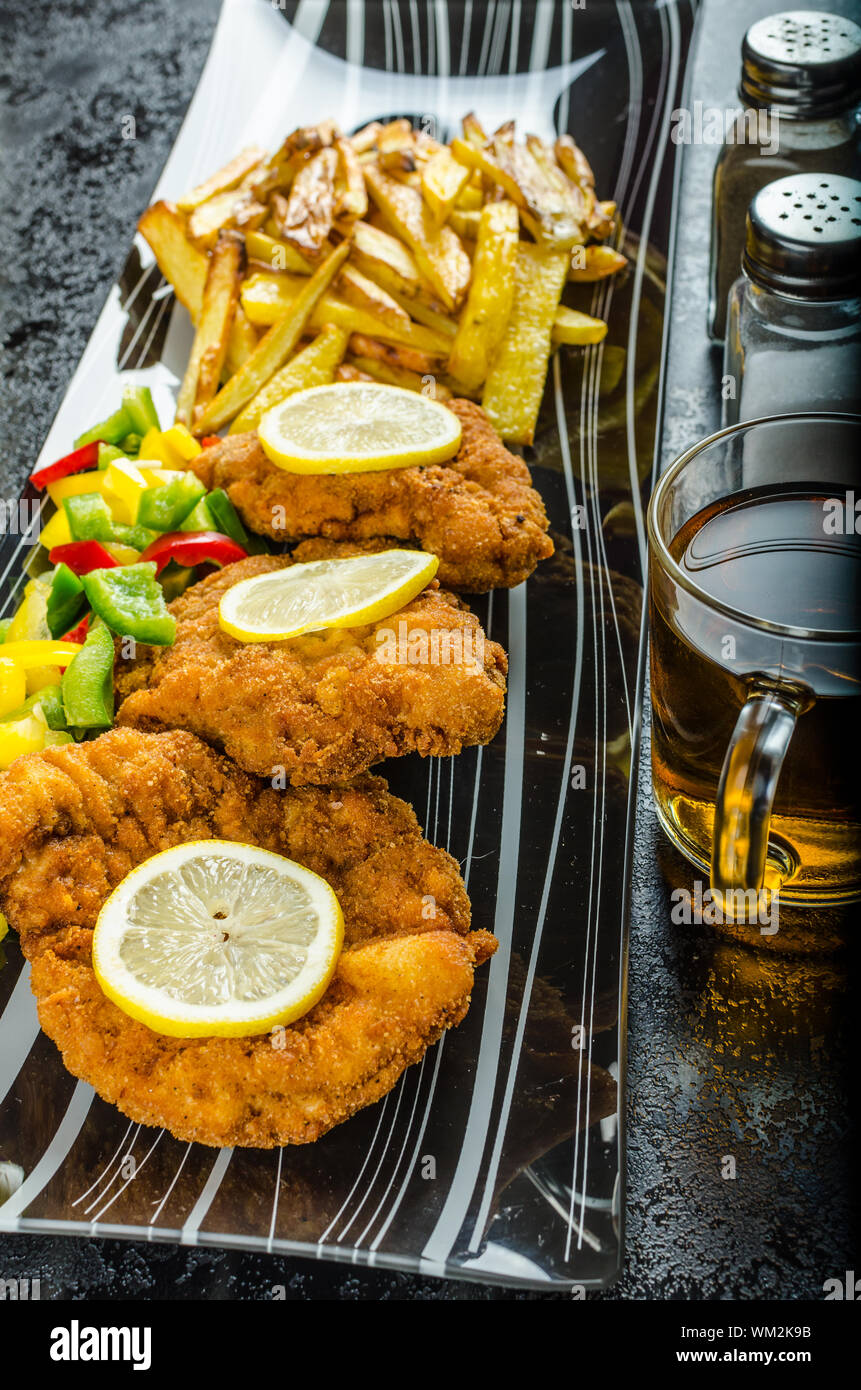 Schnitzel with french fries, homemade, platter, czech beer, vegetable ...