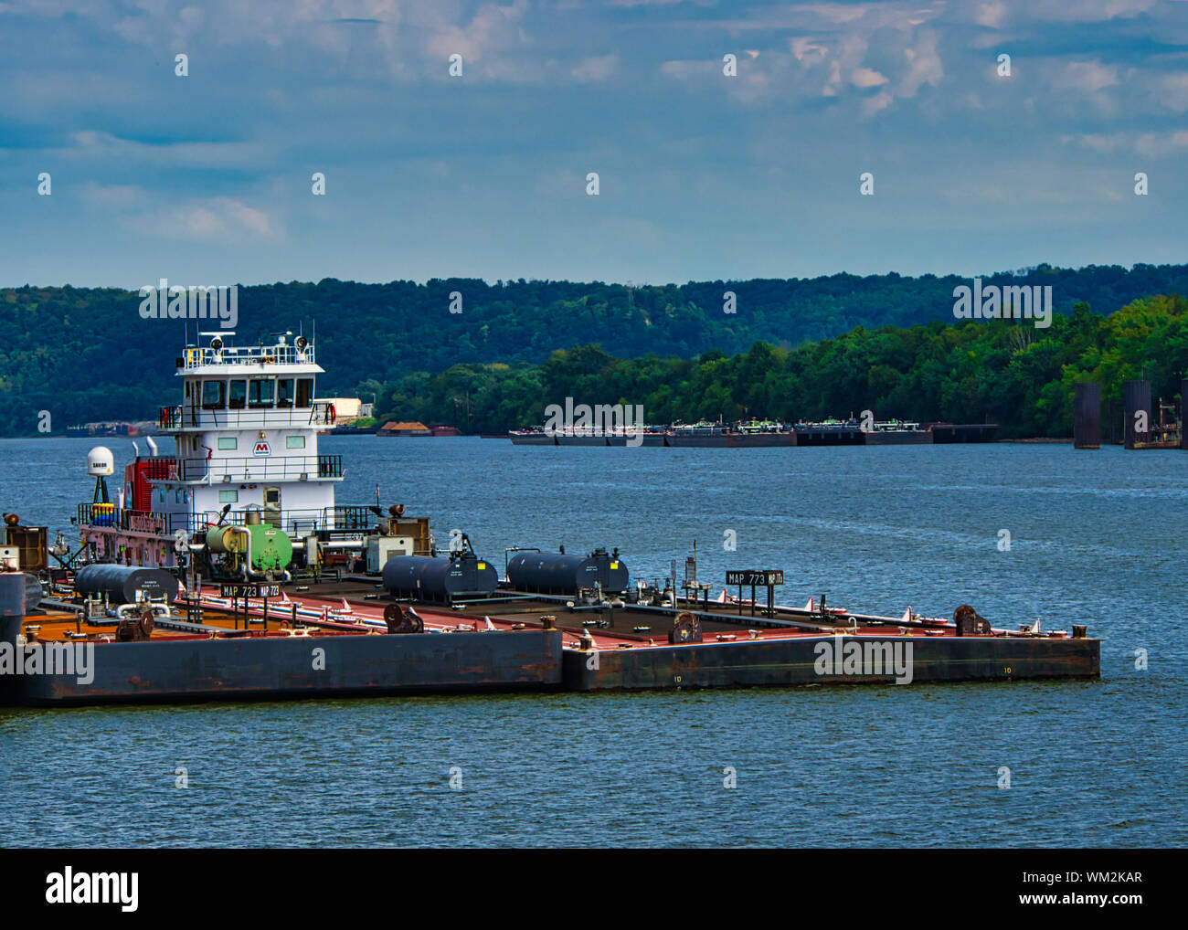 pusher boat behind a pair of barges on the Ohio river Stock Photo - Alamy