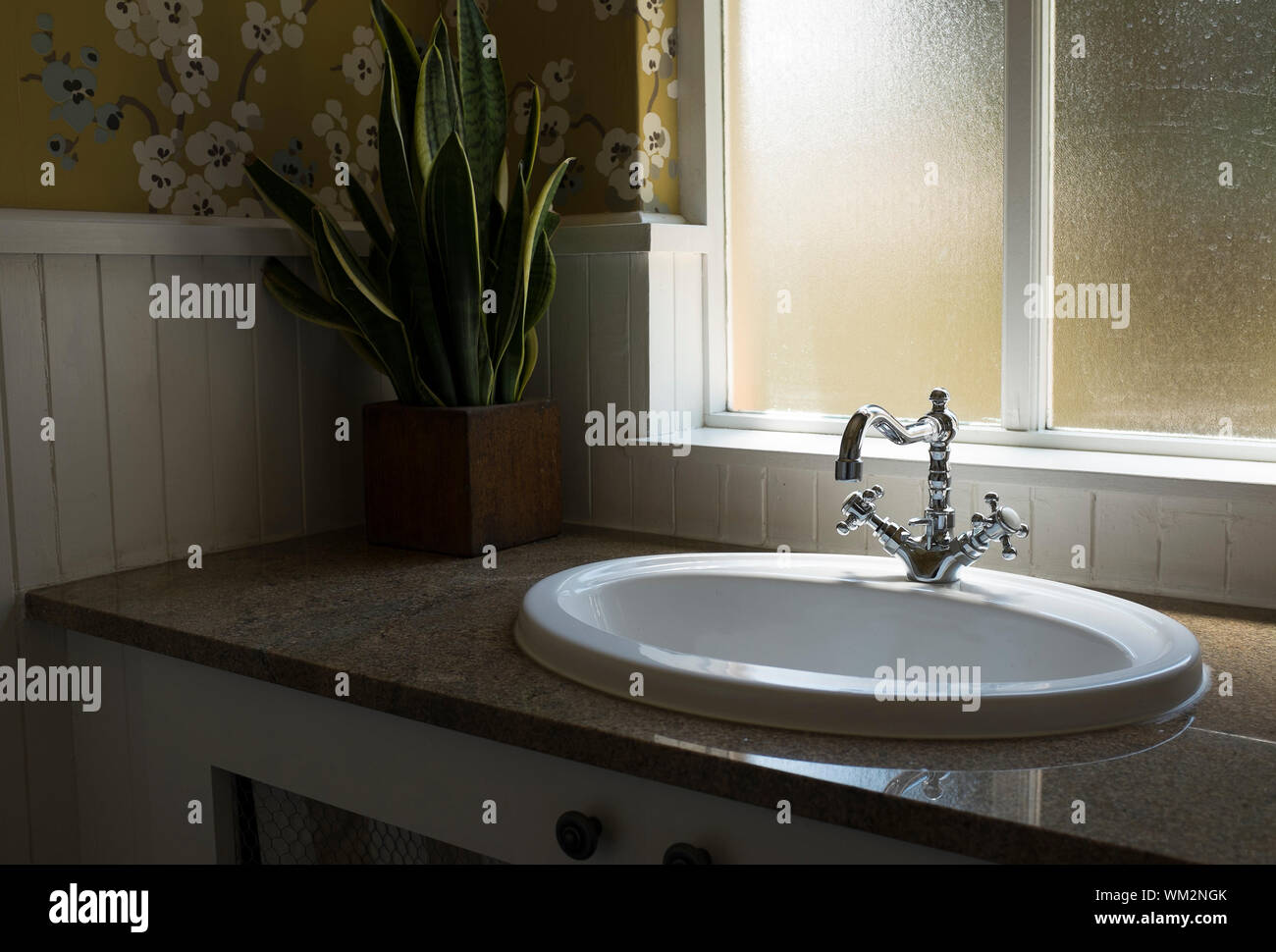 Old retro water tap basin in modern bathroom Stock Photo - Alamy