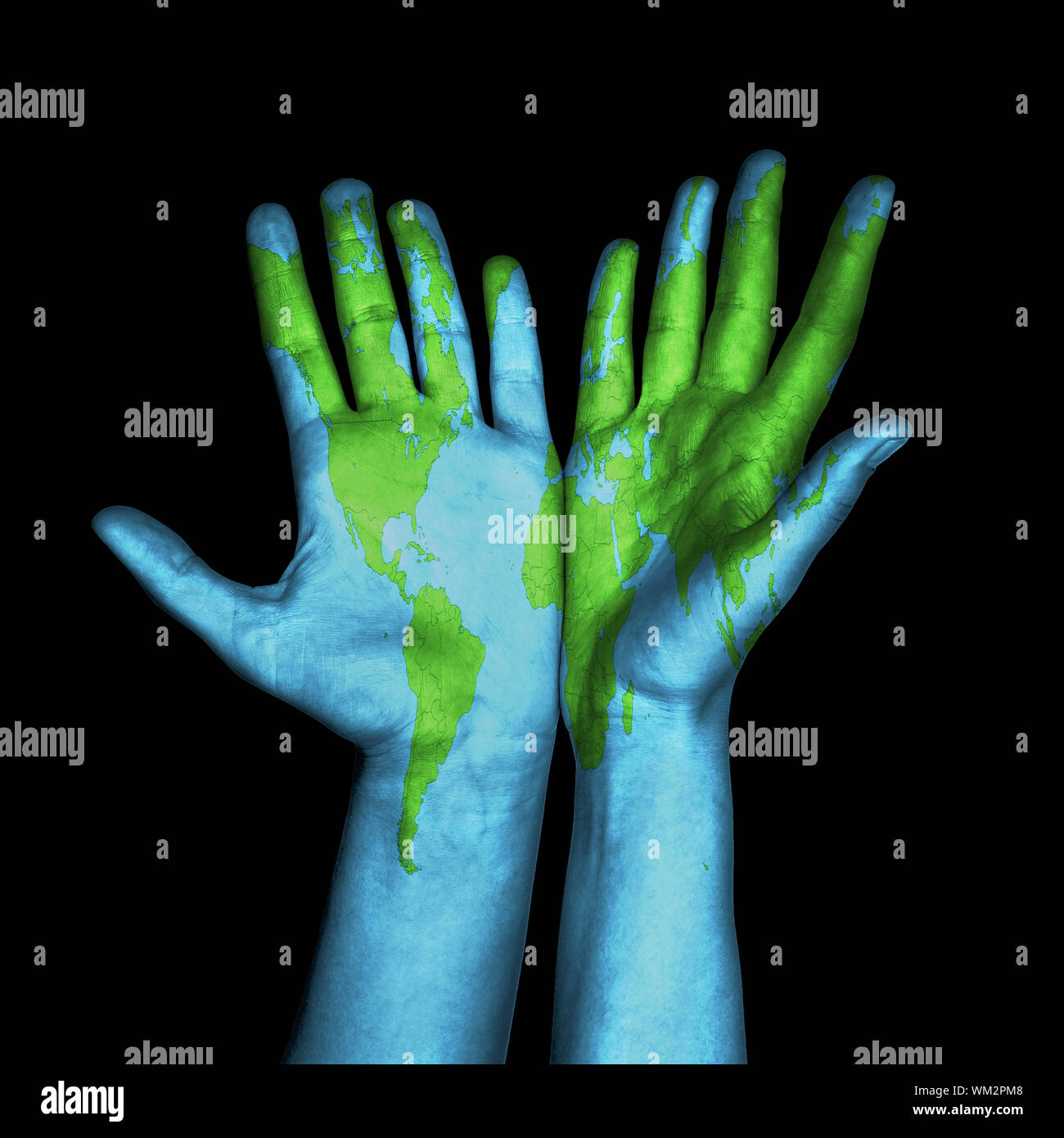 World map painted on human hands. Isolated on black background Stock ...