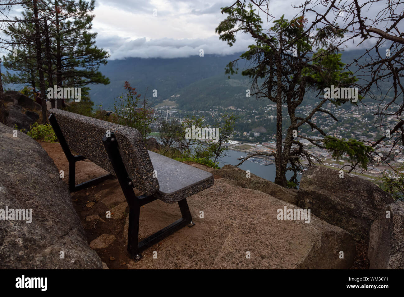 Beautiful View of a small Town, Nelson, during a dark and cloudy sunset ...