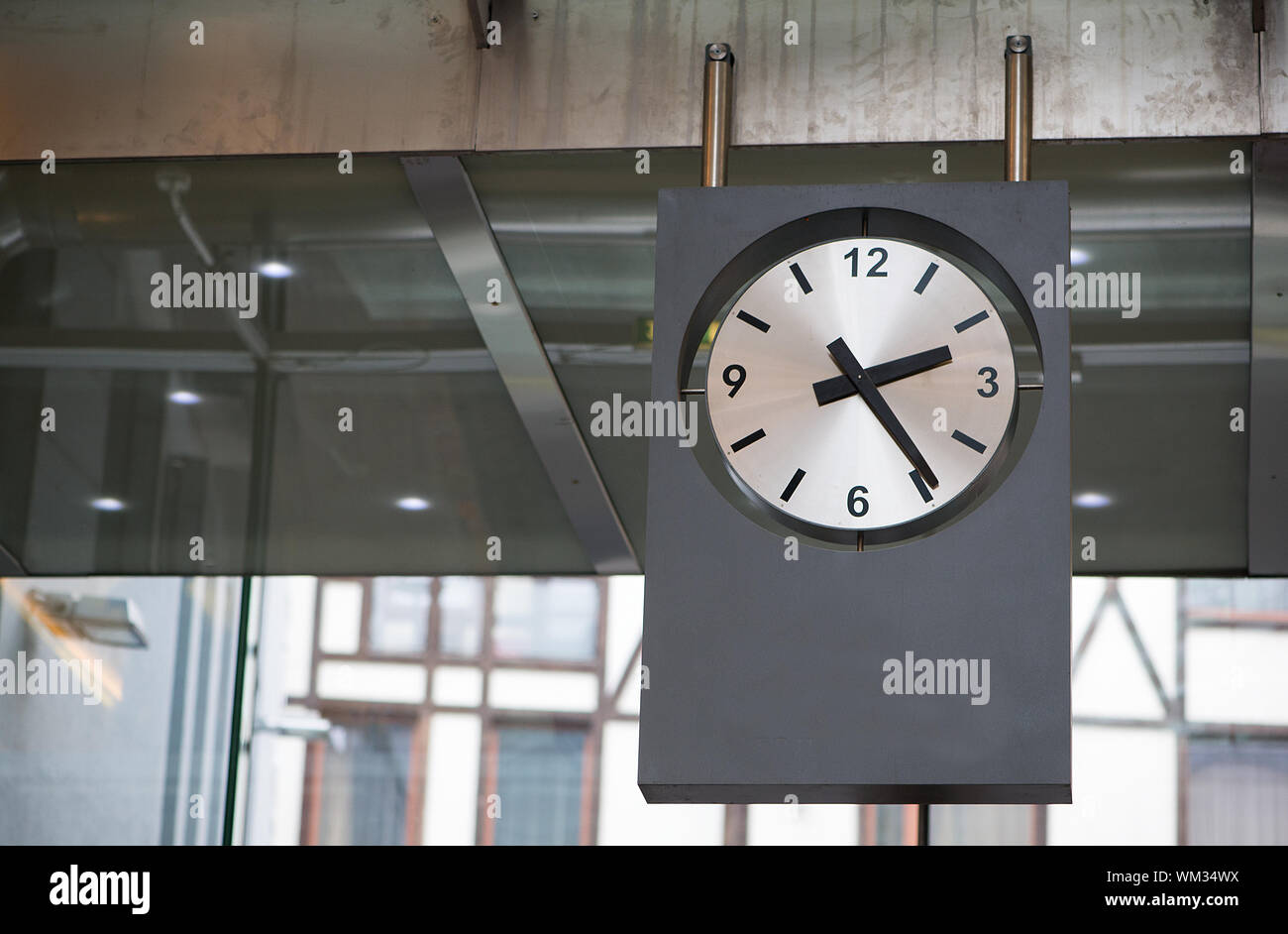 Hanging from clock hand hi-res stock photography and images - Alamy