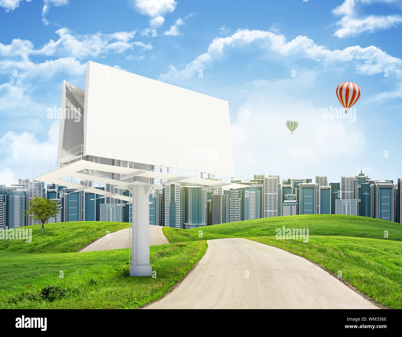 Tall buildings, green hills and road with large billboard against sky ...