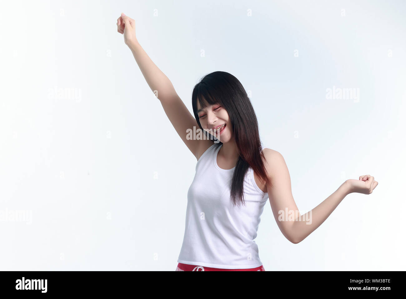 Standing happy woman hi-res stock photography and images - Alamy