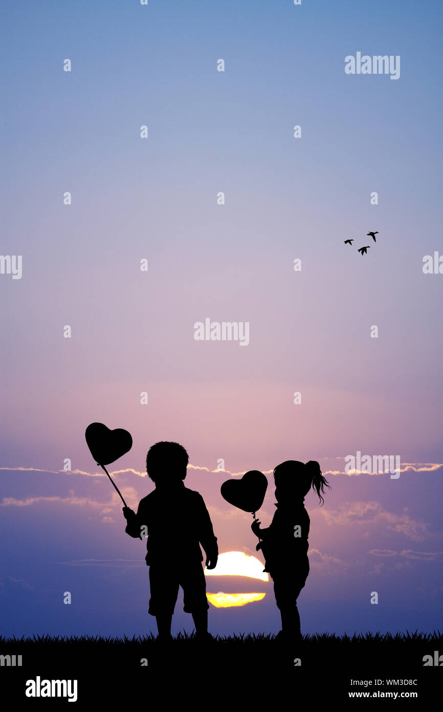 children with hearts balloons Stock Photo - Alamy
