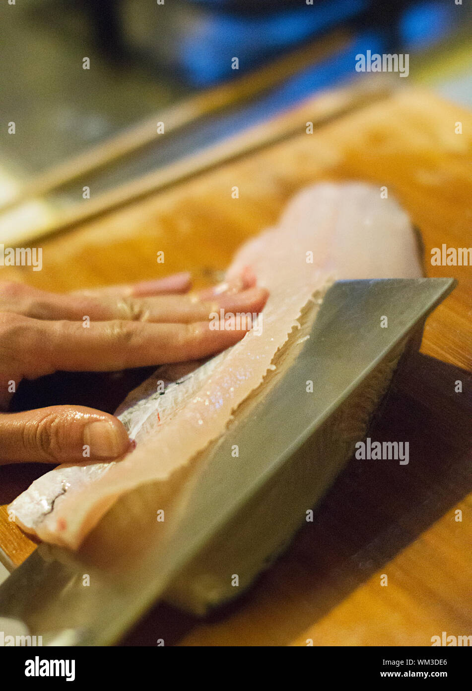 Cutting fish hi-res stock photography and images - Alamy