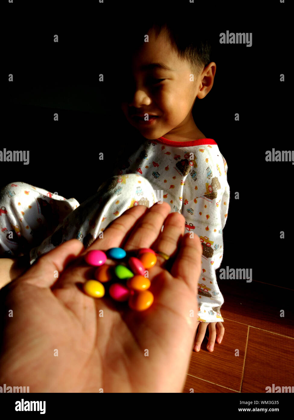 Boy giving food hi-res stock photography and images - Alamy